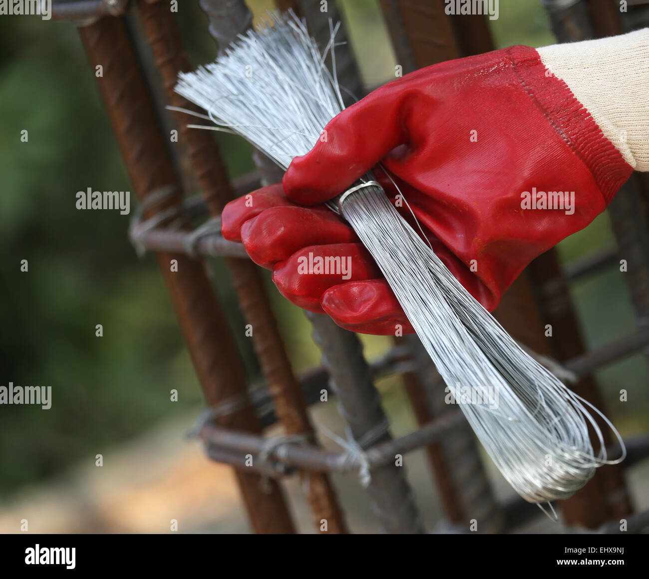 Construction wire holding by hand Stock Photo - Alamy