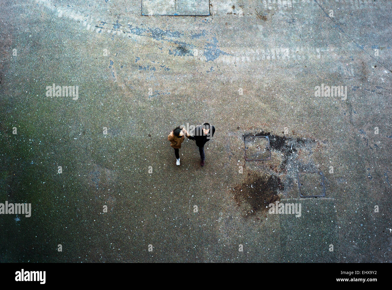 Two people walking seen from above a birds eye view from Tate Modern ...