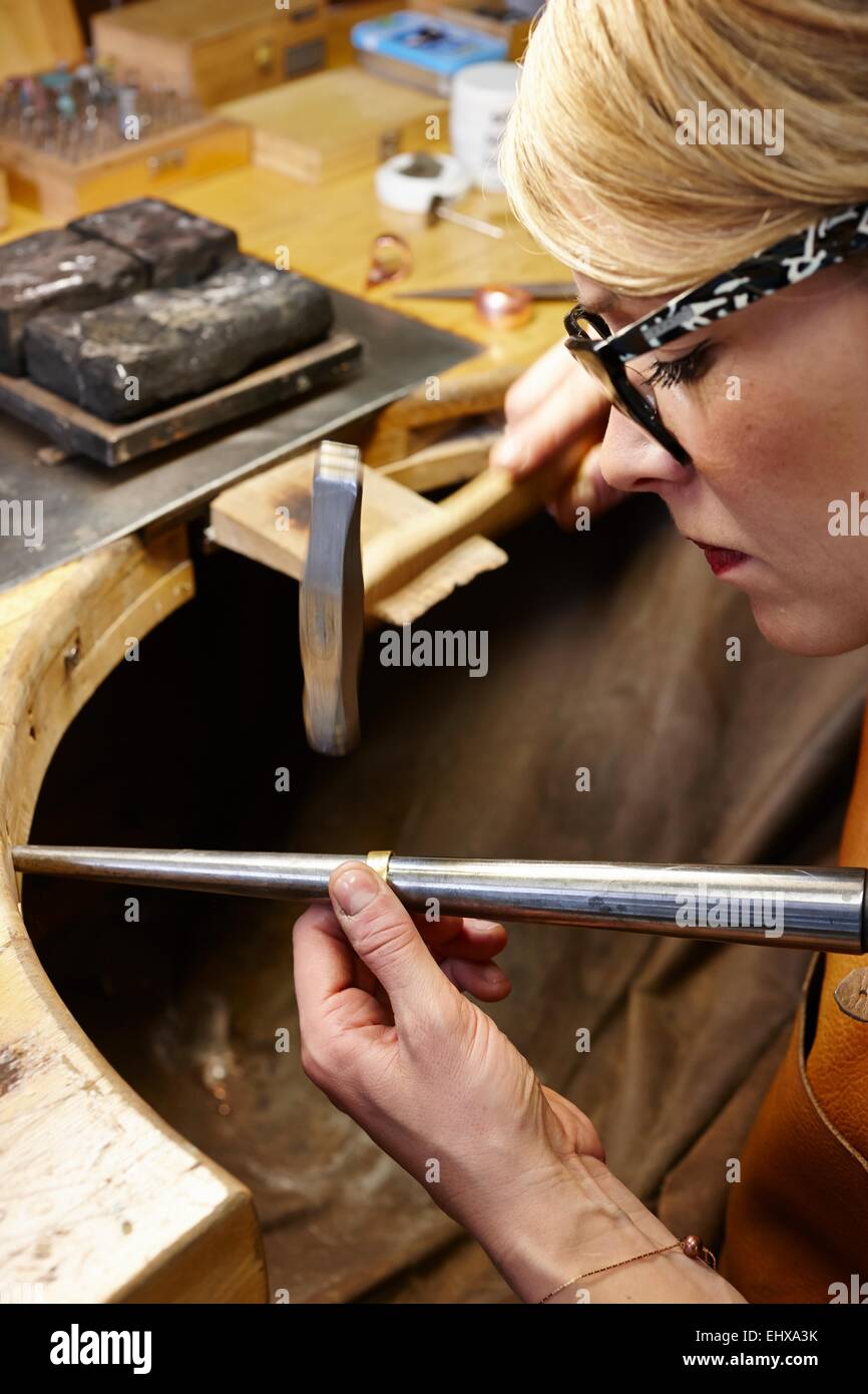 Goldsmith in workshop at work Stock Photo - Alamy
