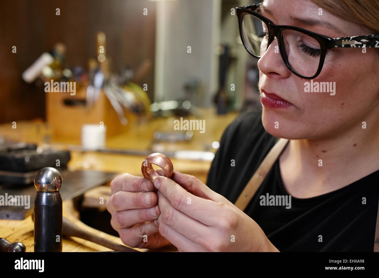 Goldsmith in workshop at work Stock Photo - Alamy