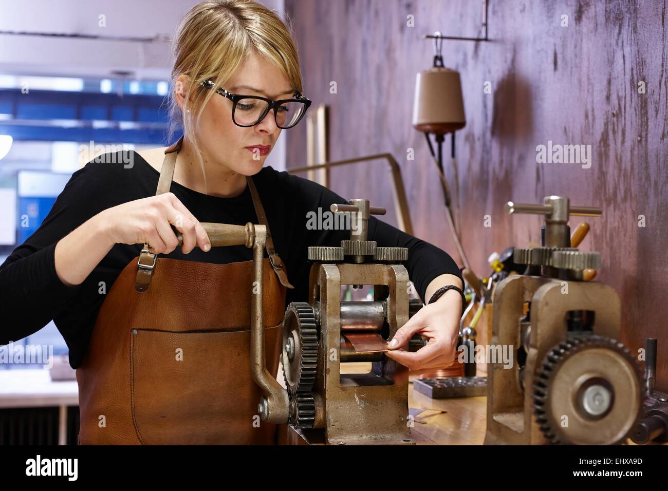Goldsmith in workshop at work Stock Photo - Alamy
