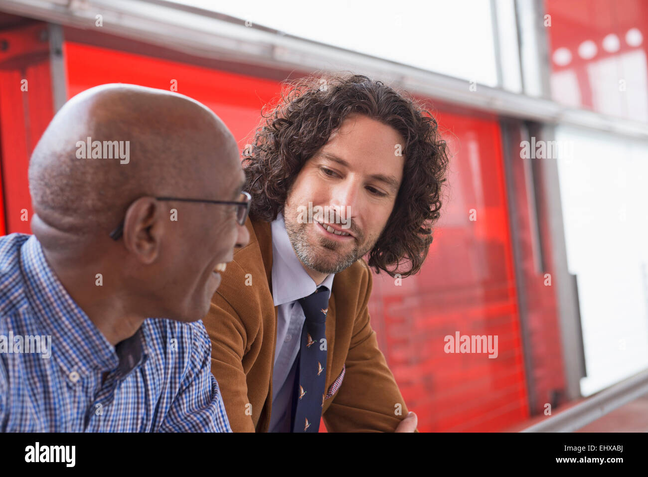 Close up Two men meeting talking African Caucasian Stock Photo - Alamy
