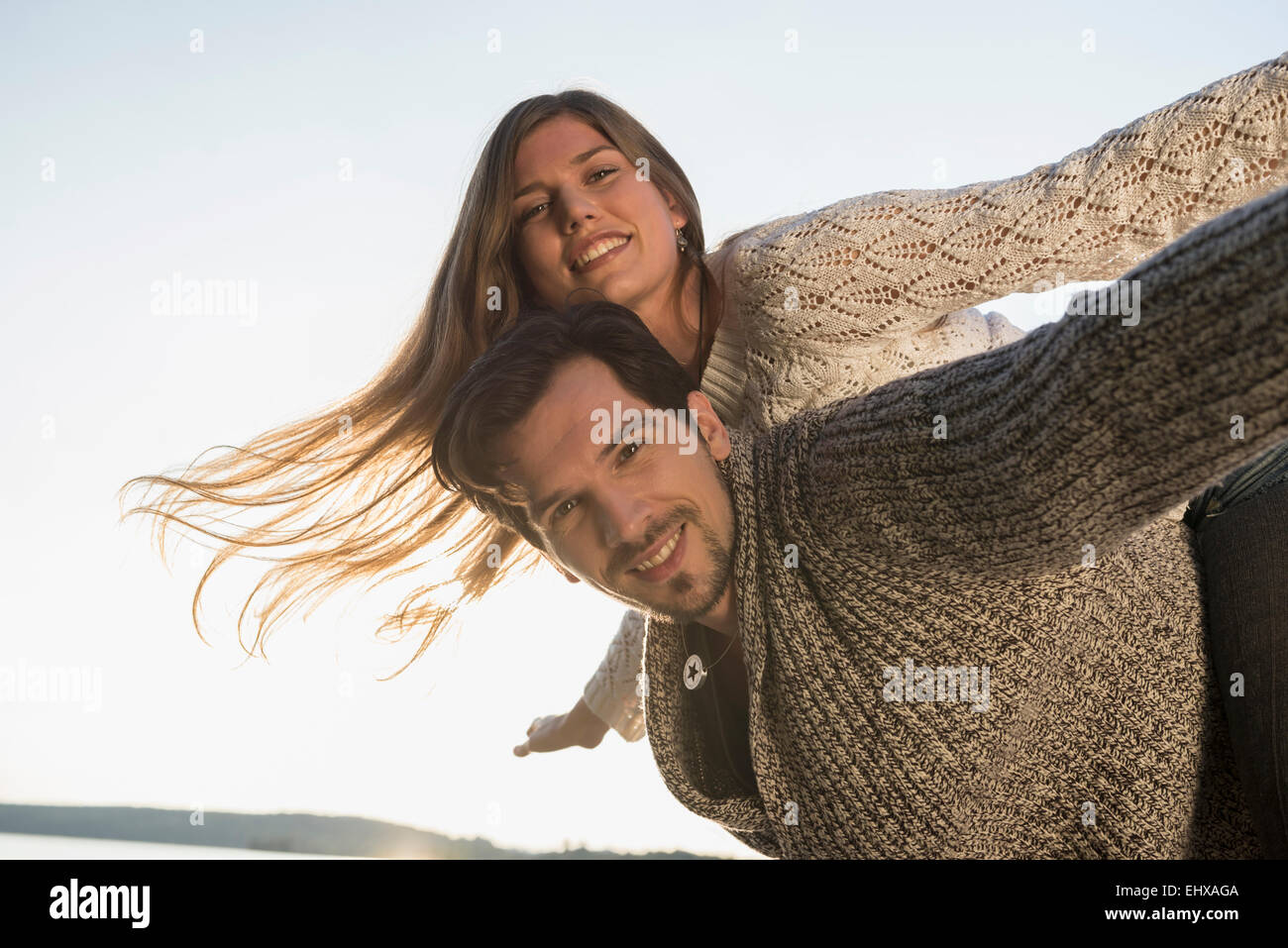 Woman riding on shoulders man hi-res stock photography and images - Alamy