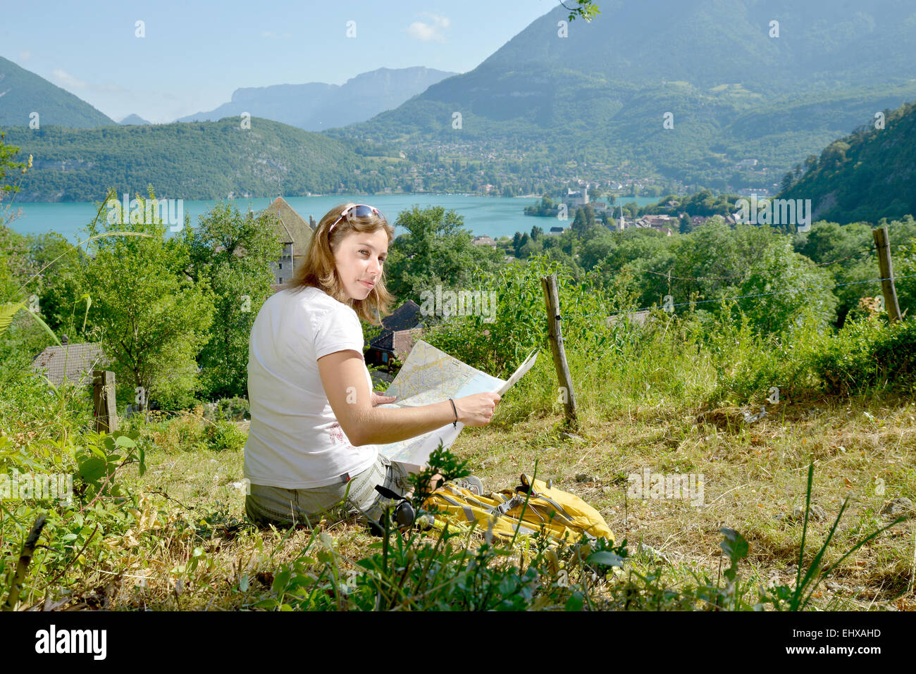 young and pretty woman looking her way for French Alps Stock Photo - Alamy