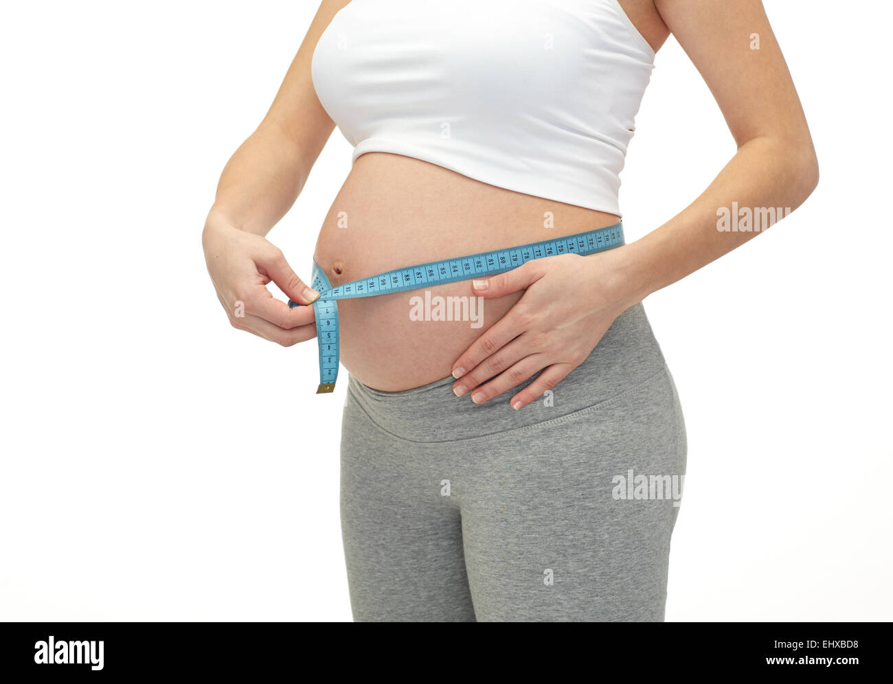 close up of pregnant woman measuring her tummy Stock Photo - Alamy