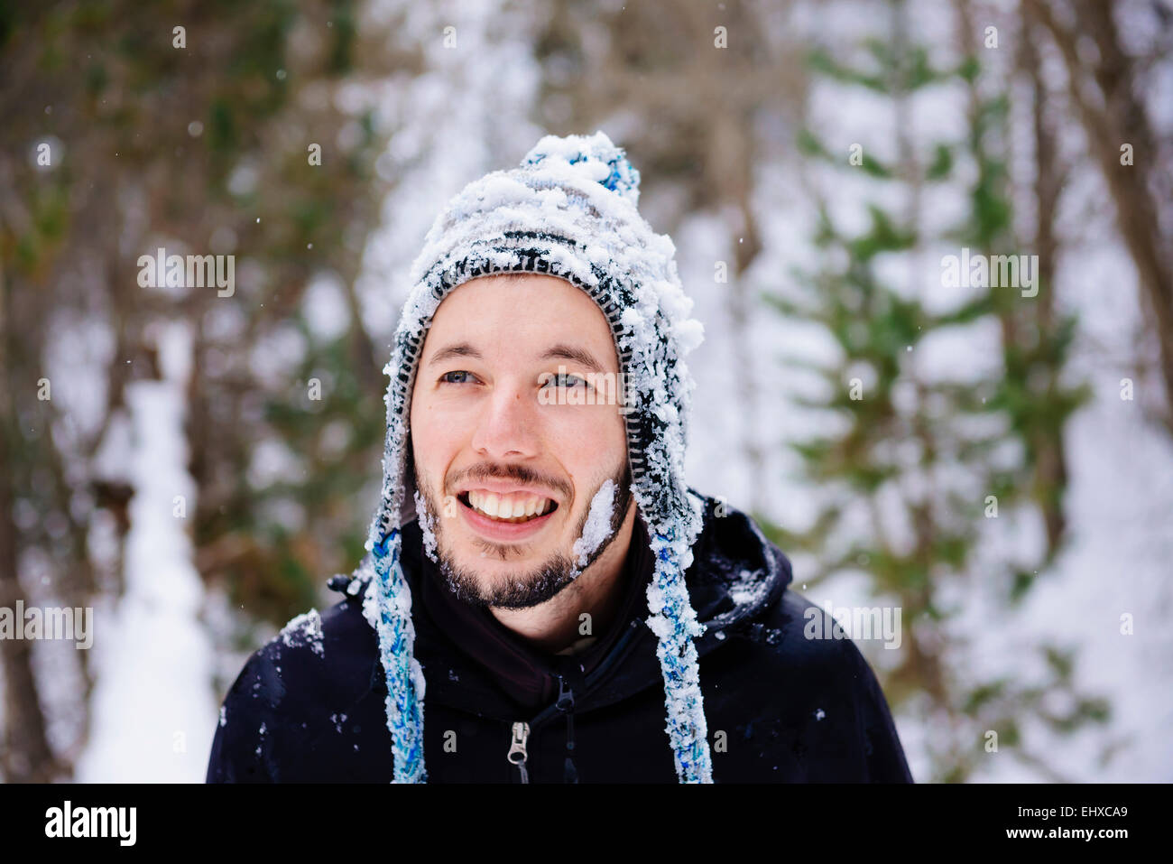 Man covered with snow in the forest Stock Photo - Alamy
