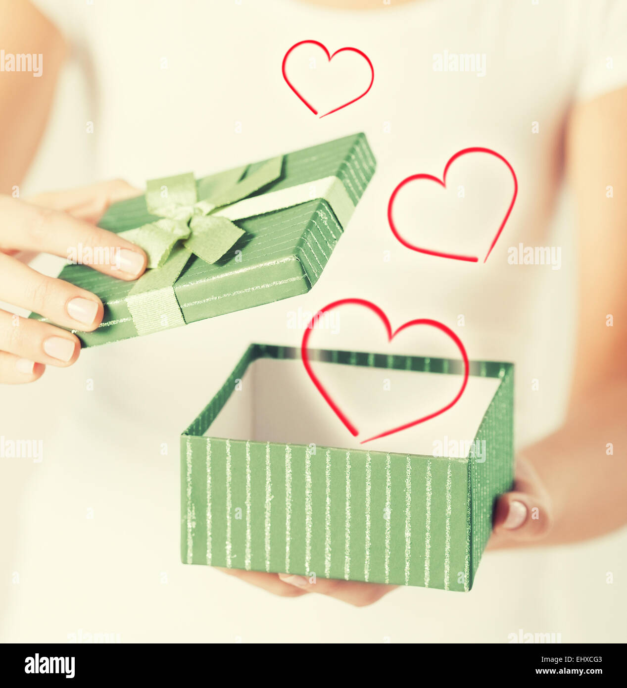 woman hands with gift box Stock Photo - Alamy