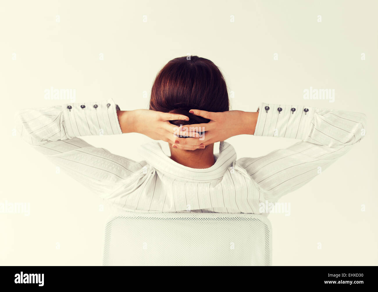 Businesswoman finishing work relaxing desk hi-res stock photography and ...