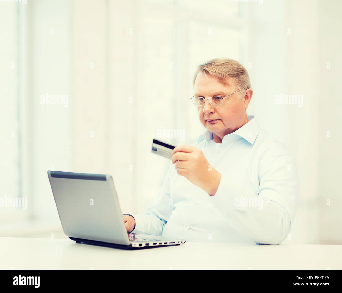 old man with laptop and credit card at home Stock Photo - Alamy