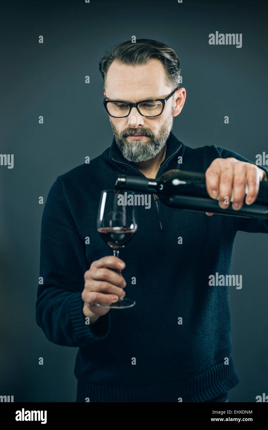 Man tasting red wine Stock Photo - Alamy