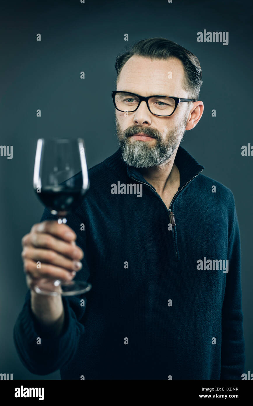 Man tasting red wine Stock Photo - Alamy