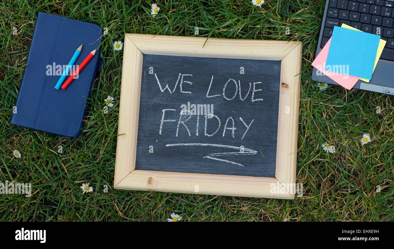 We love friday written on a chalkboard outside the office Stock Photo ...
