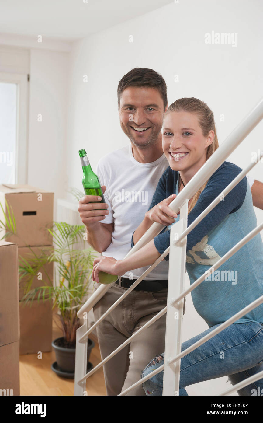 Couple drinking beer in new home, Bavaria, Germany Stock Photo - Alamy