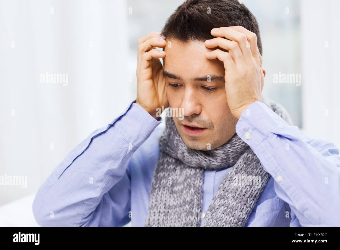 close up of ill man with flu and headache at home Stock Photo - Alamy