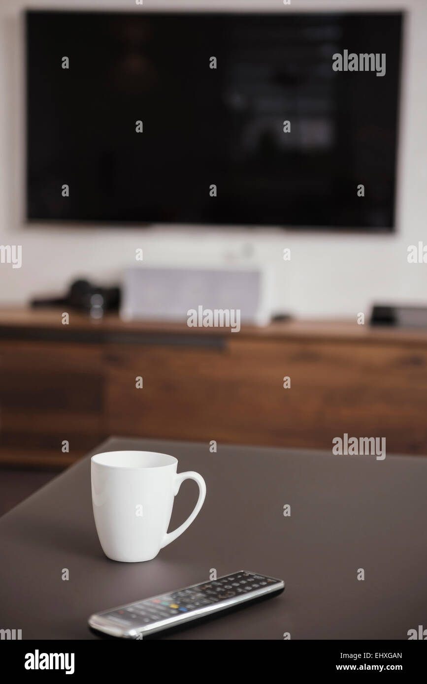 Tv control on coffee table hi-res stock photography and images - Alamy