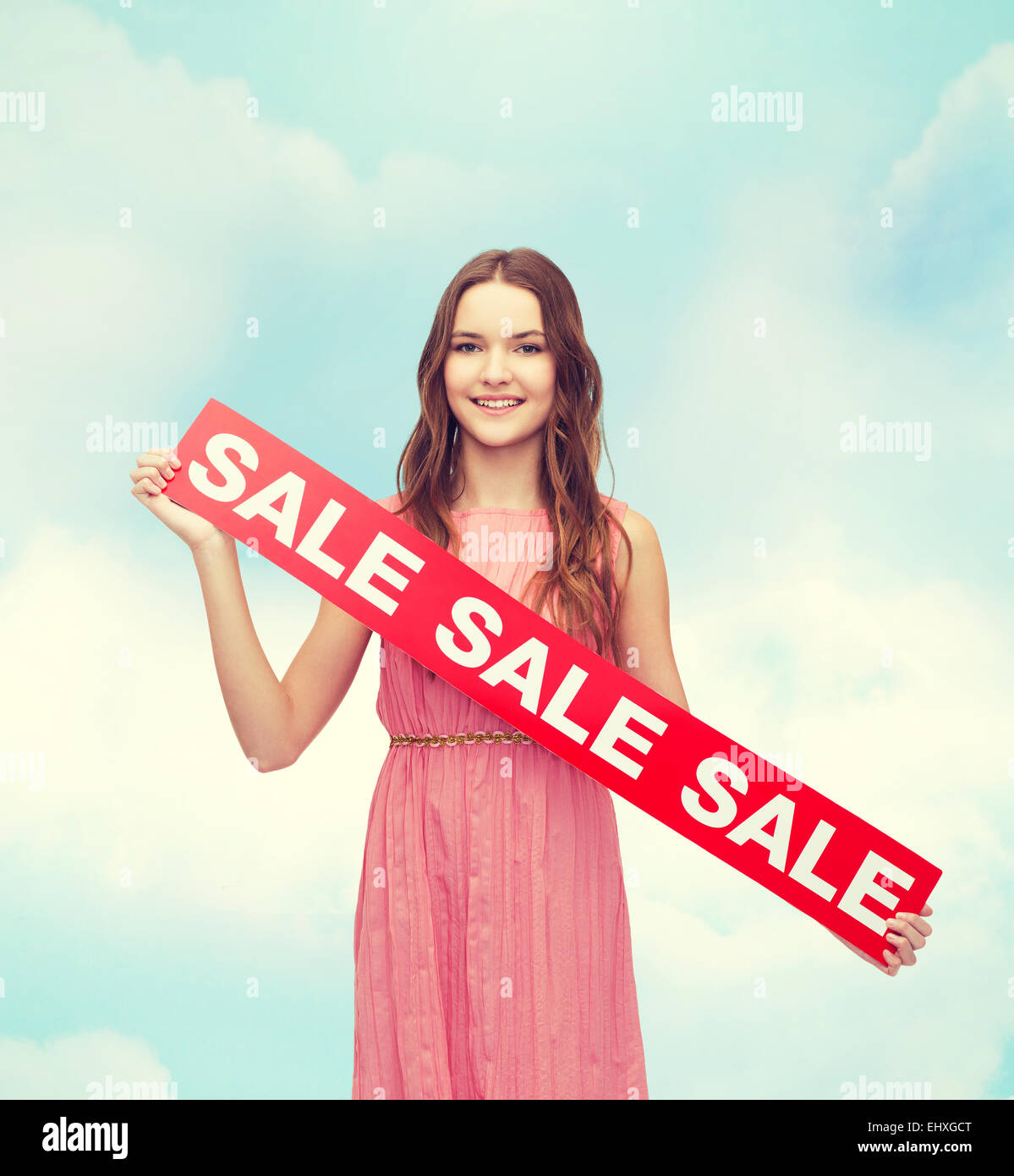 young woman in dress with sale sign Stock Photo - Alamy