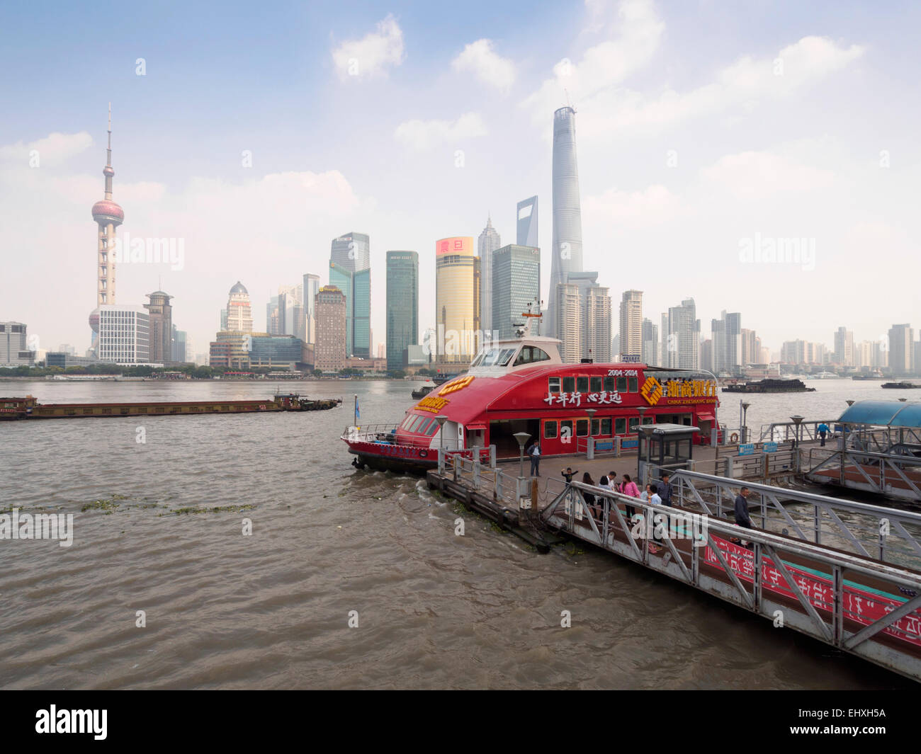 Touristic cruise boat docked on the Huangpu river in front of the ...