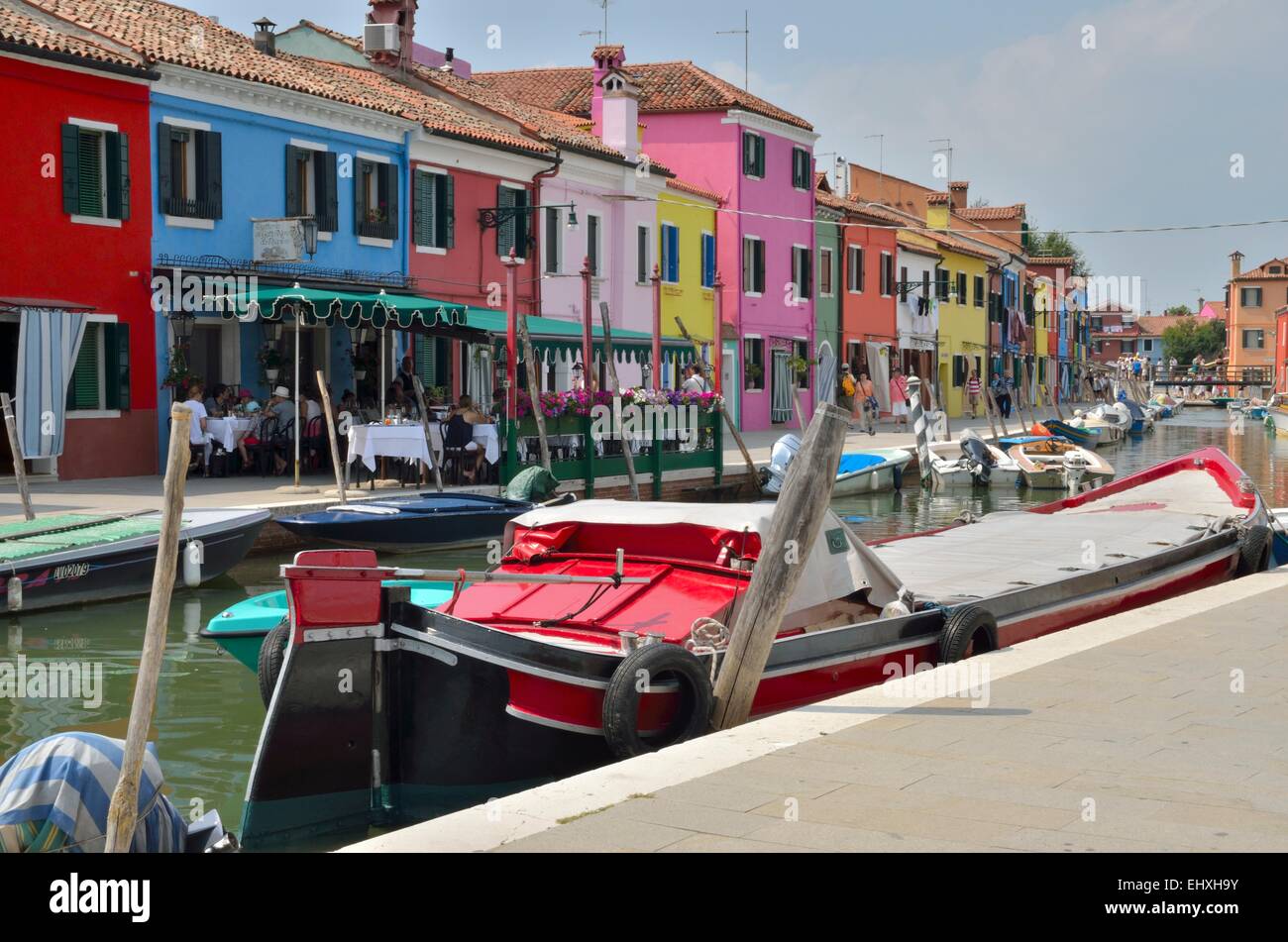 Colorful houses along a canal in Burano, a colorful island of Venice, Italy Stock Photo - Alamy