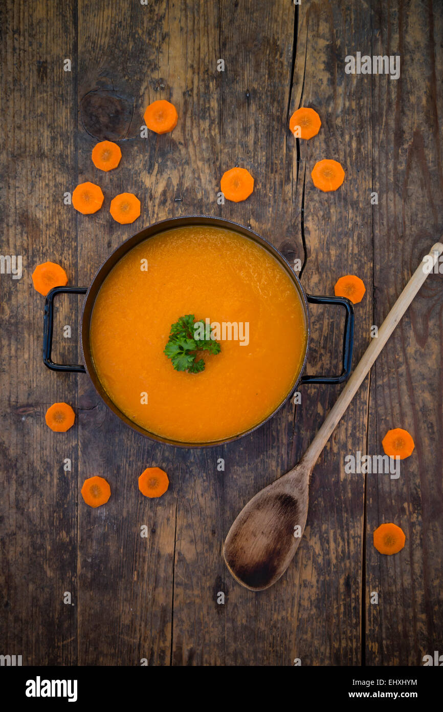 Cooking pot of carrot soup Stock Photo - Alamy