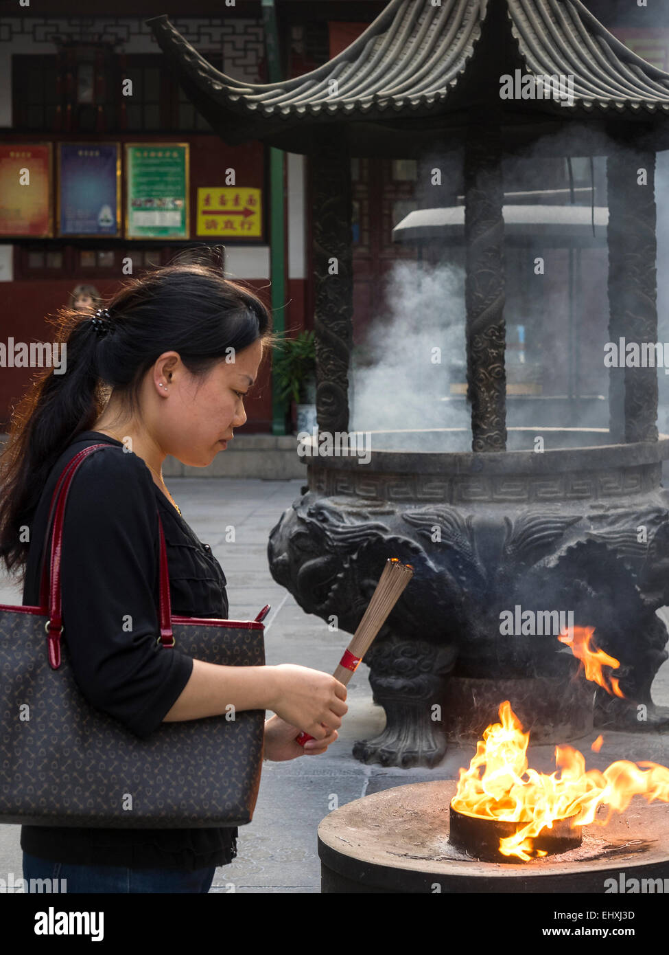 Praying joss stick hi-res stock photography and images - Alamy
