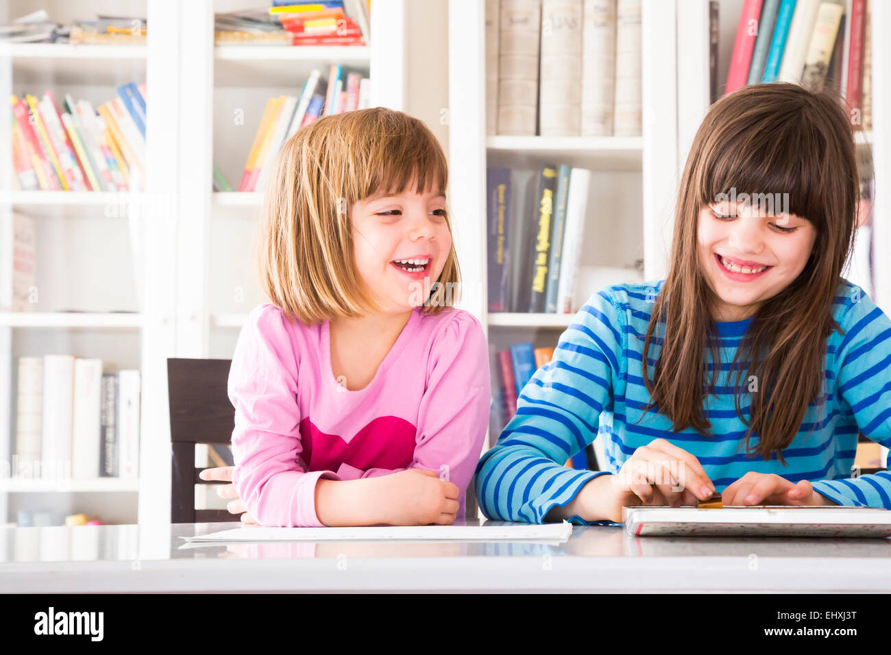 Two girls having fun Stock Photo - Alamy