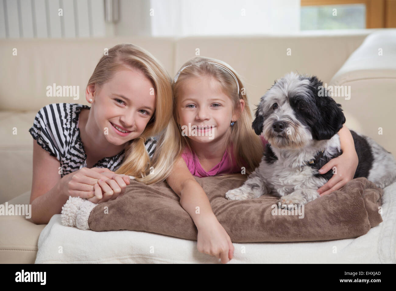 Two girls one dog hi-res stock photography and images - Alamy