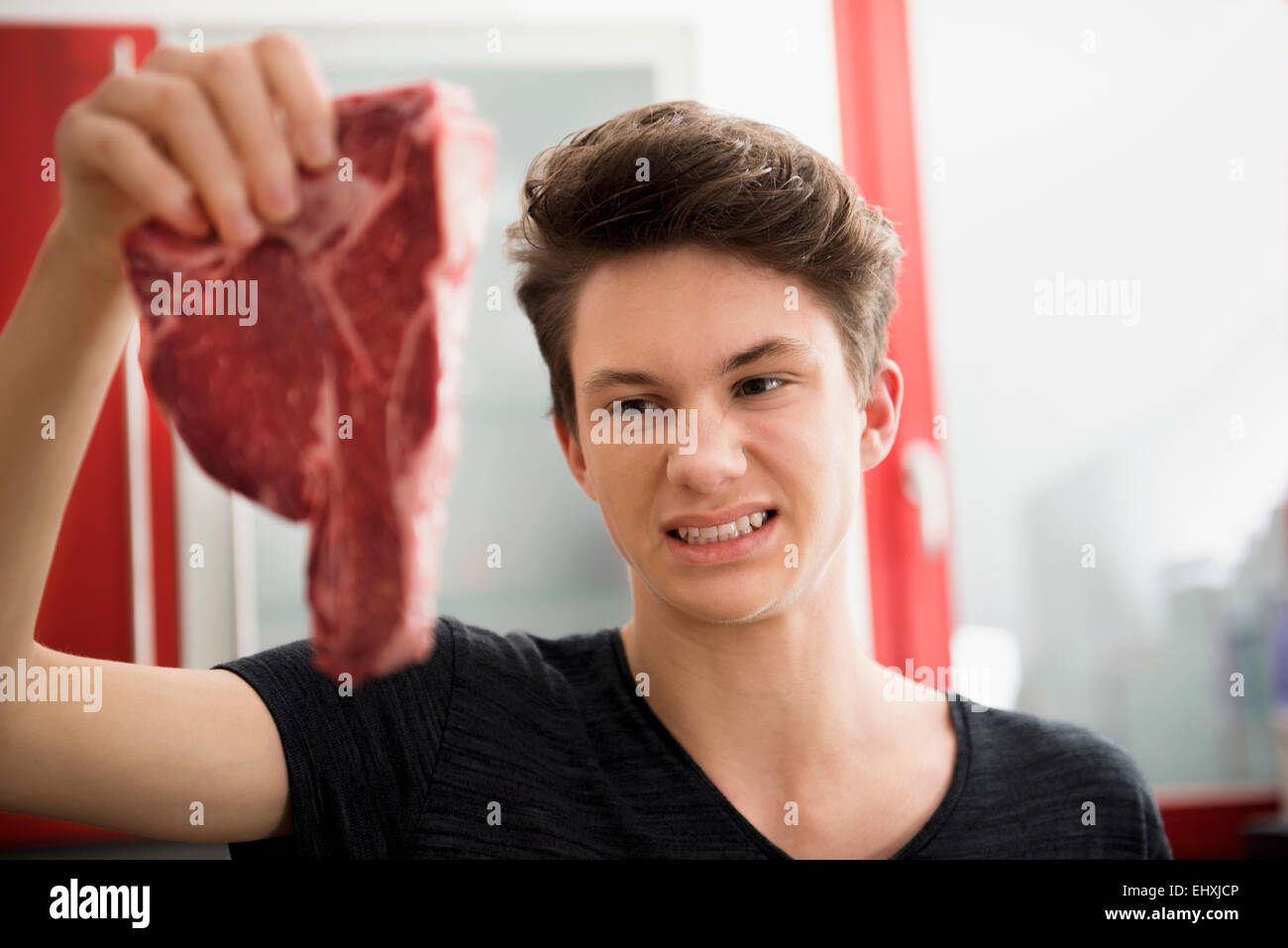 Young man dislikes ham hi-res stock photography and images - Alamy