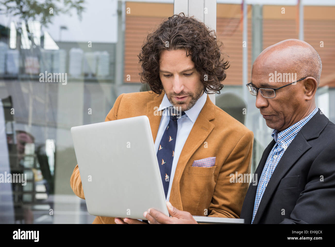 Portrait businessmen laptop computer suit meeting Stock Photo - Alamy