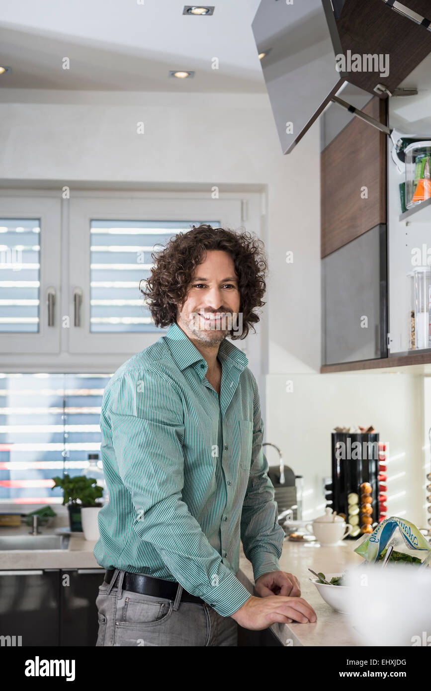 Man preparing food in the kitchen, Munich, Bavaria, Germany Stock Photo ...