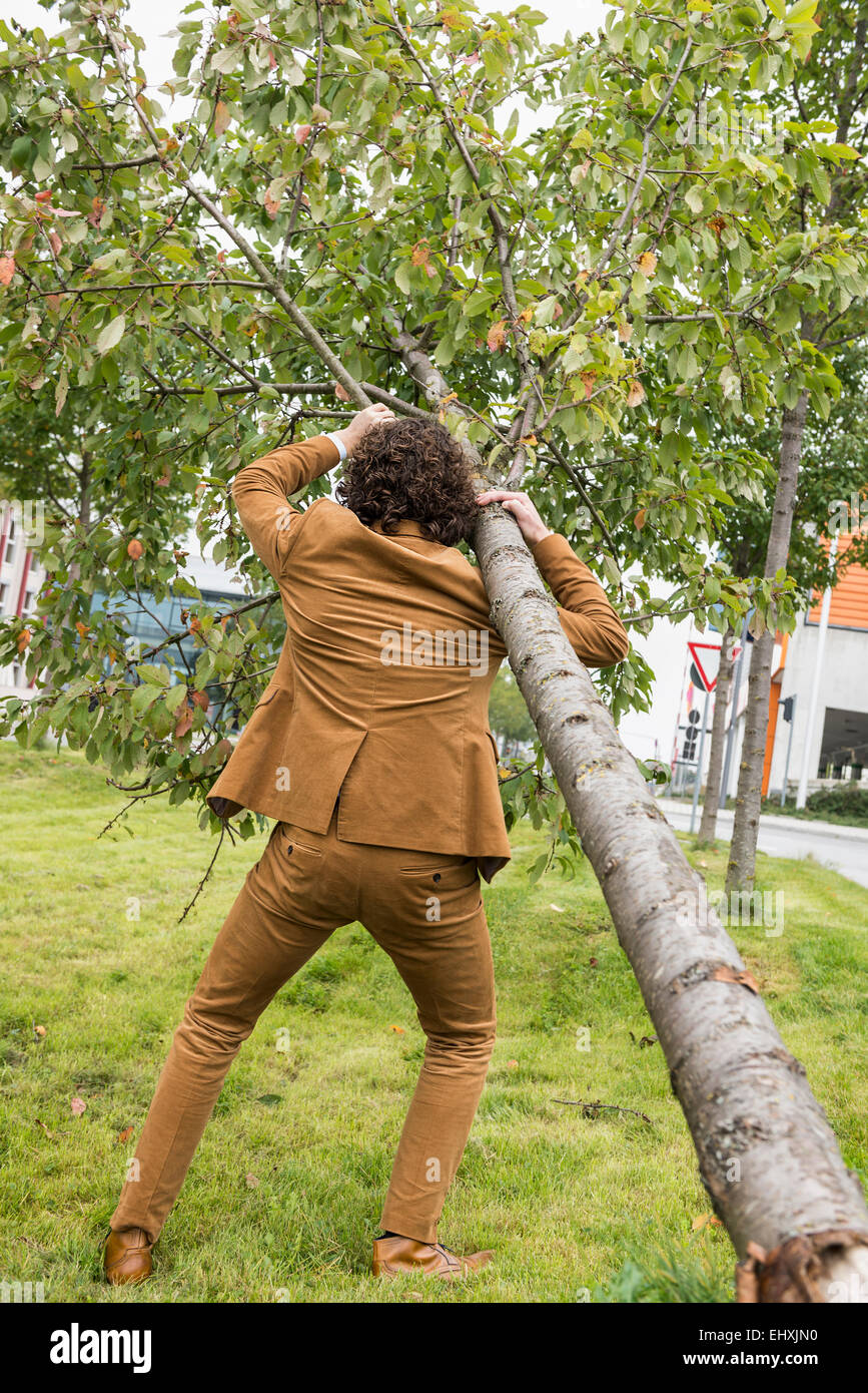 Curled businessman hi-res stock photography and images - Alamy