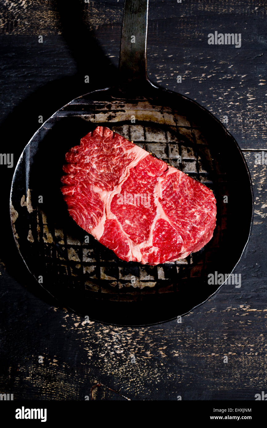 Raw beef in pan Stock Photo - Alamy