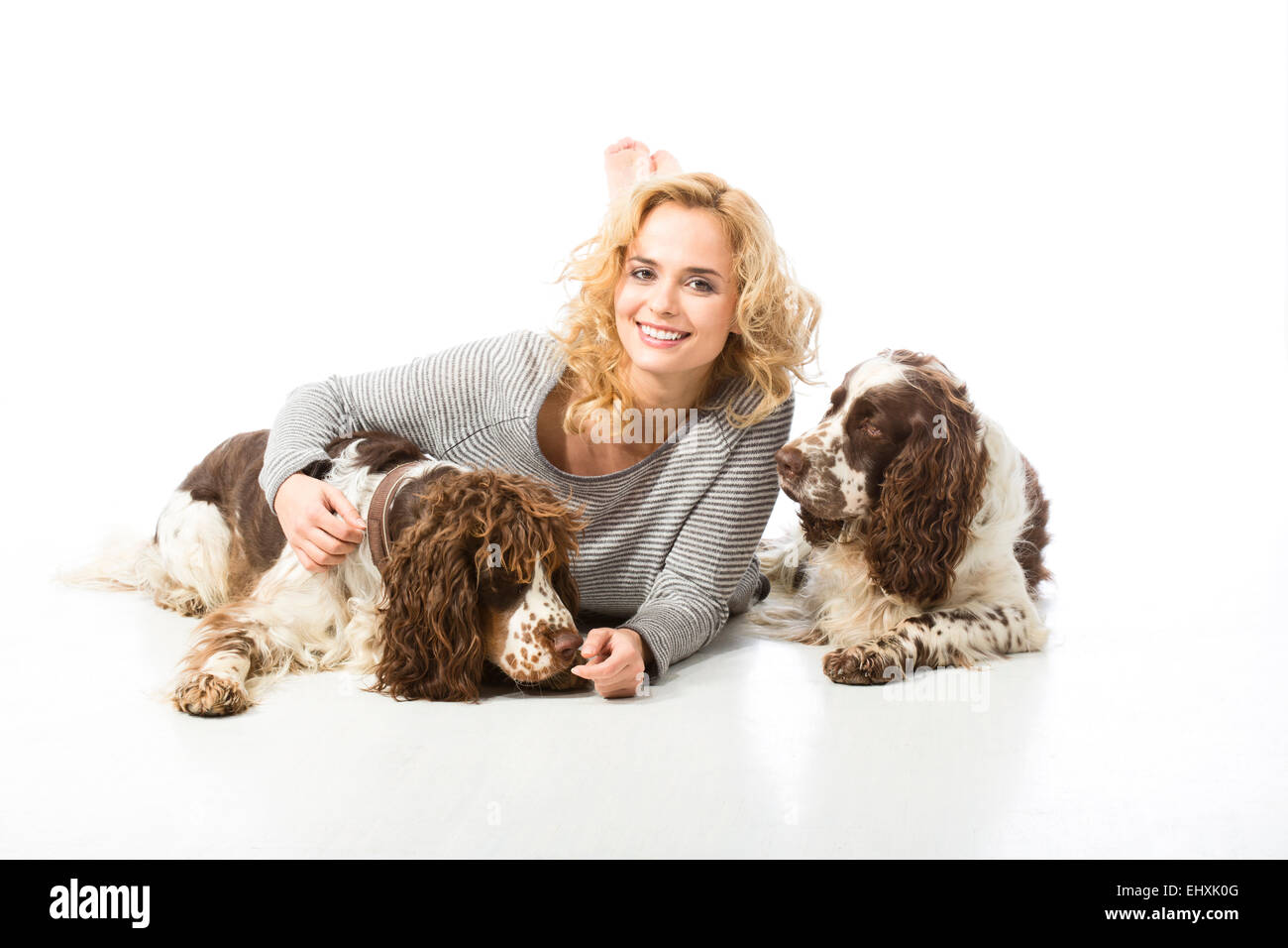 Young woman with two dogs hi-res stock photography and images - Alamy