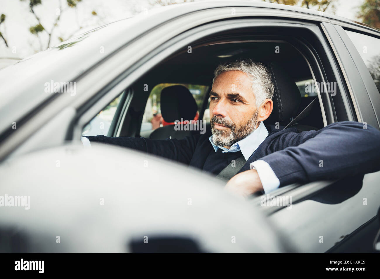 Man driving car Stock Photo - Alamy