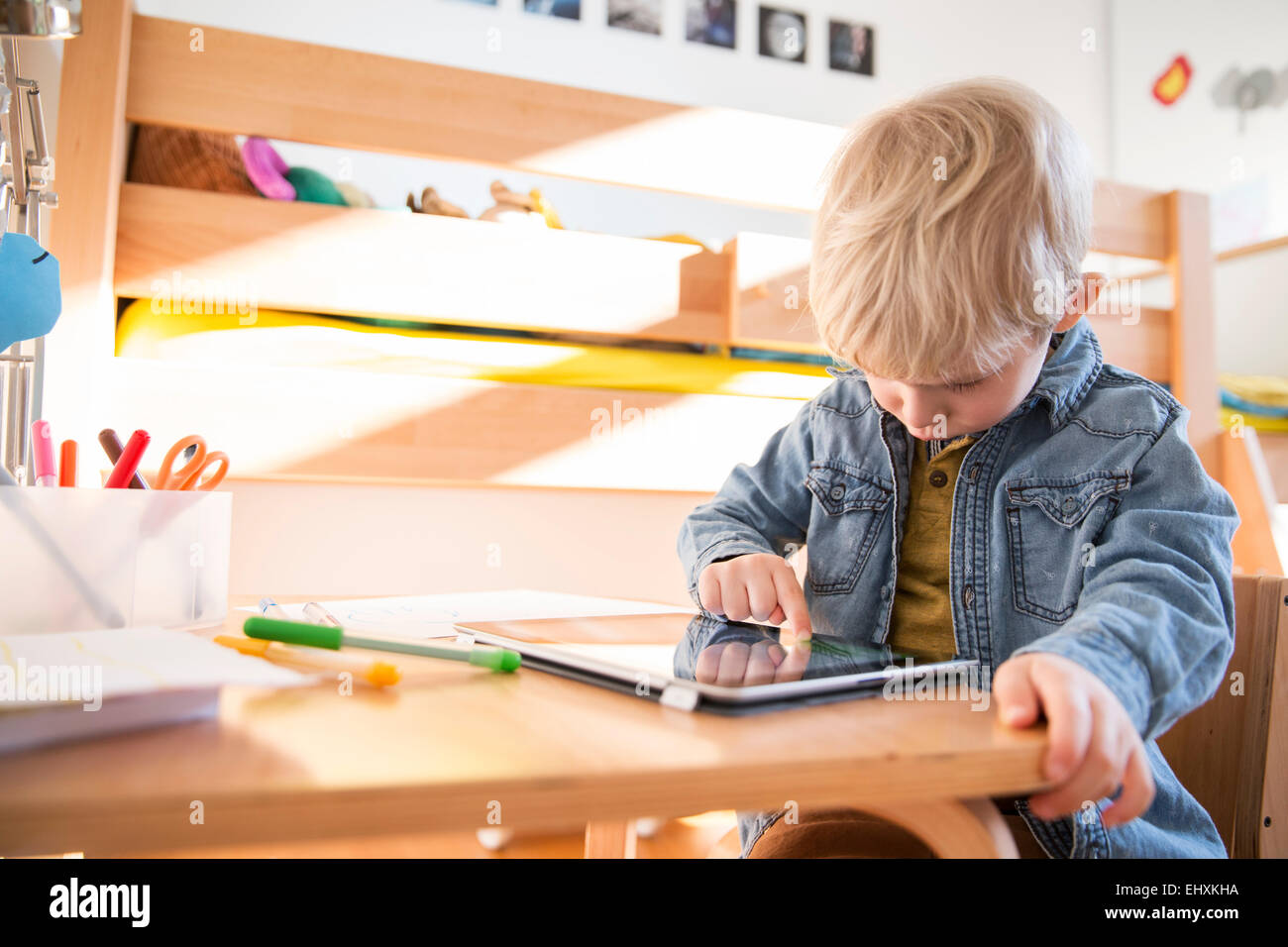 Little boy drawing with digital tablet Stock Photo - Alamy