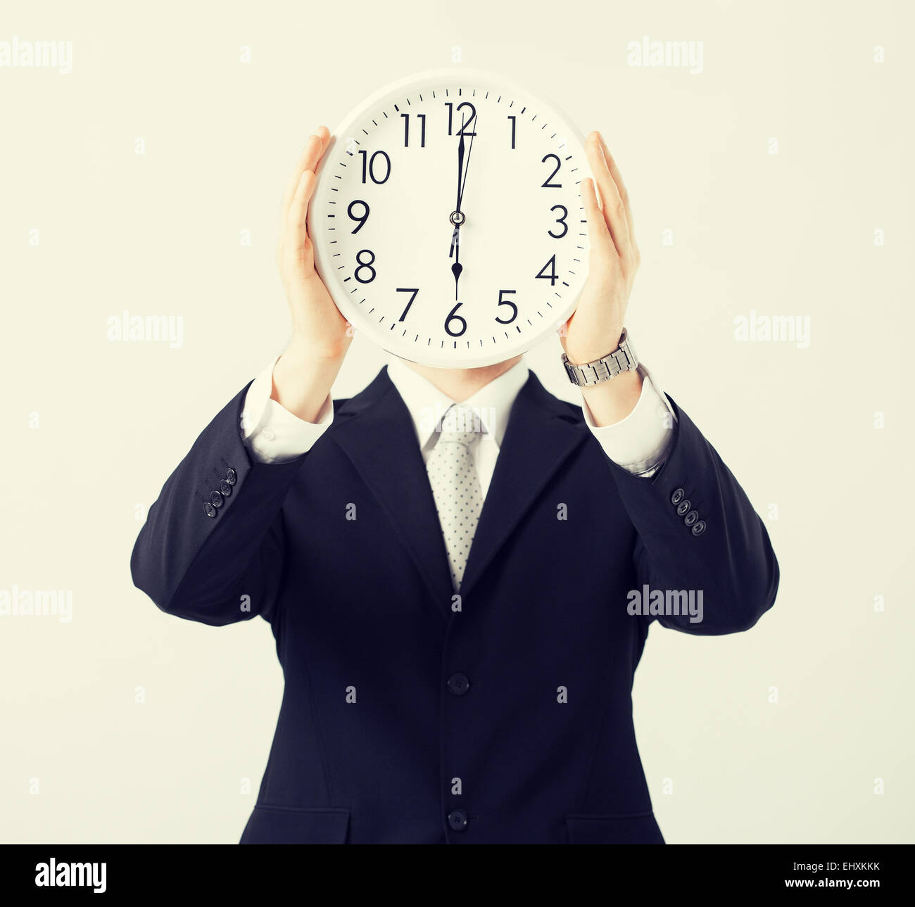 man with wall clock Stock Photo - Alamy