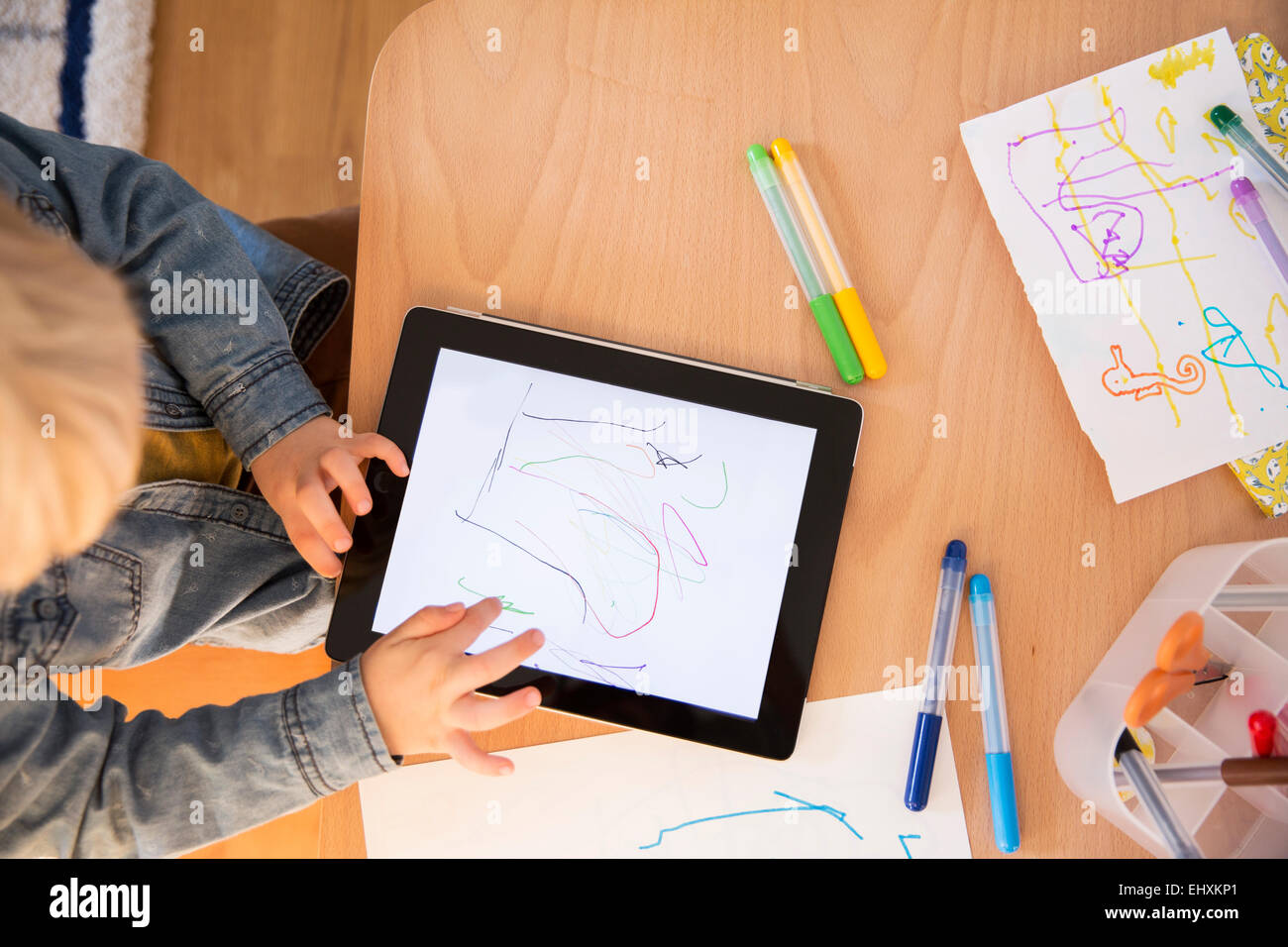 Little boy drawing with digital tablet Stock Photo - Alamy