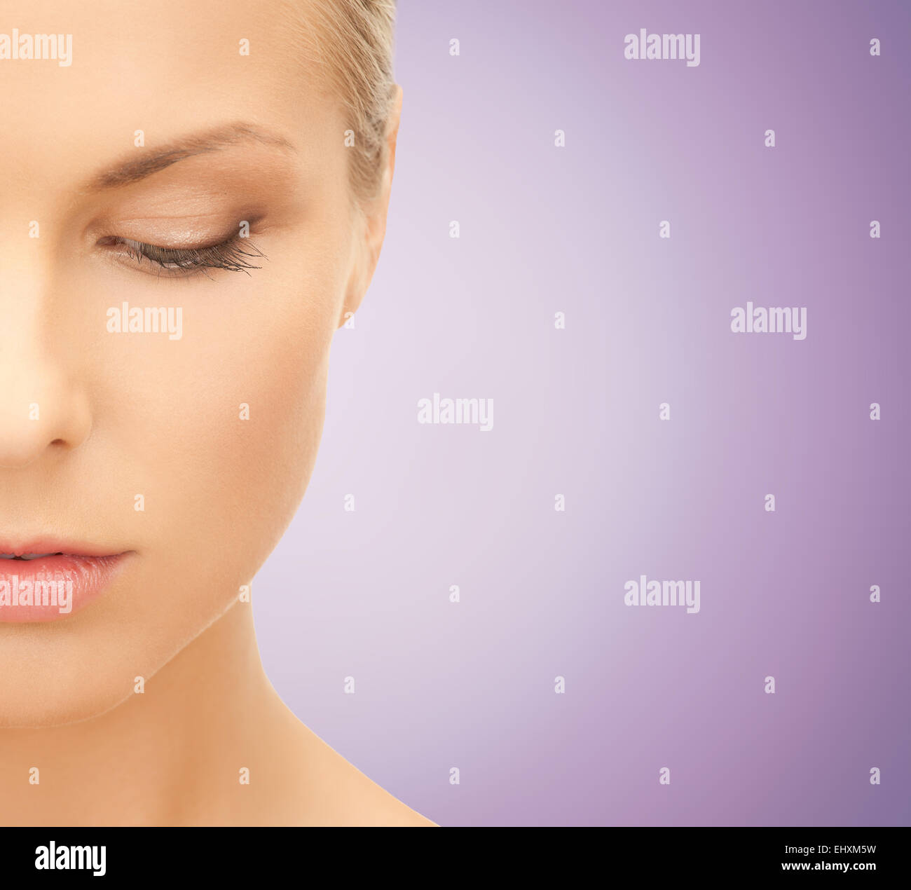 close up of beautiful young woman looking down Stock Photo - Alamy