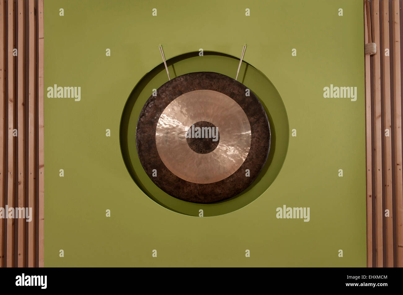 still life gong hanging wall fitness studio Stock Photo - Alamy