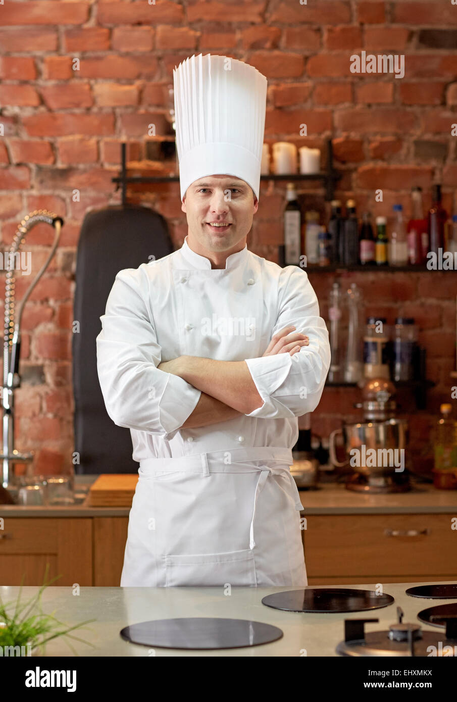 happy male chef cook in restaurant kitchen Stock Photo - Alamy