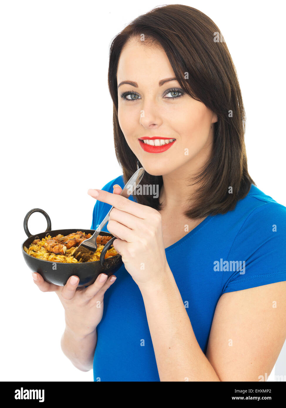 Attractive Young Woman Eating Chicken Tikka Biryani Stock Photo - Alamy