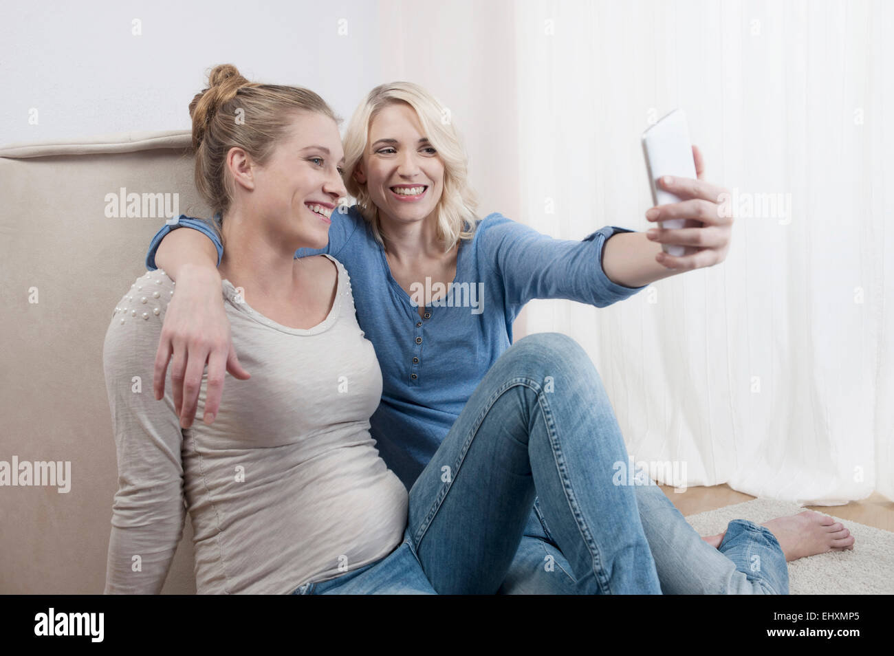 Pregnant woman girlfriend smiling selfie photo Stock Photo - Alamy