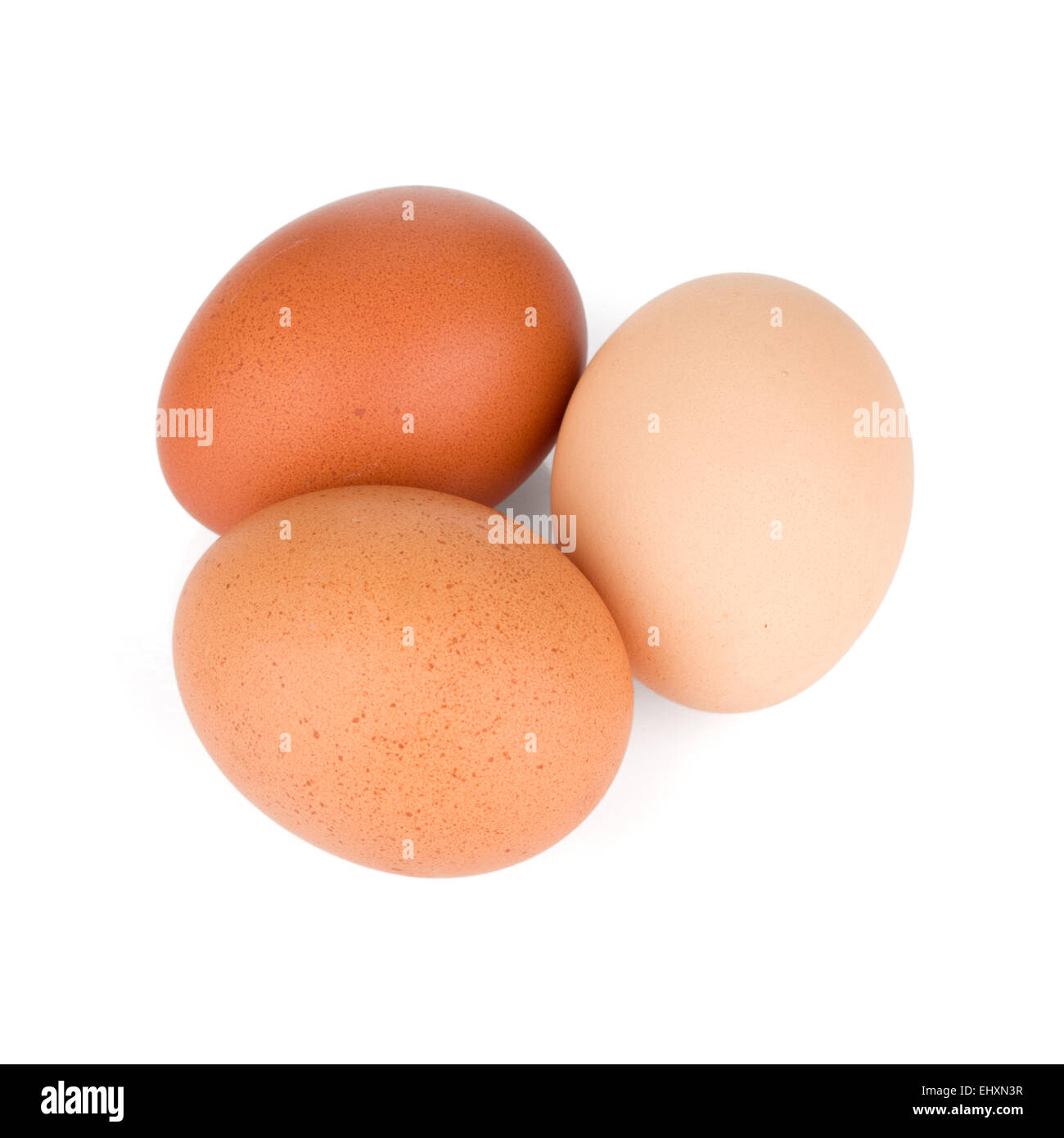 Three eggs. Isolated on white background Stock Photo - Alamy