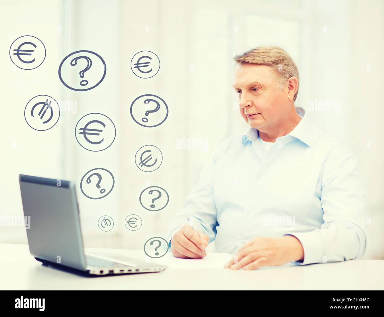 old man with laptop filling a form at home Stock Photo - Alamy