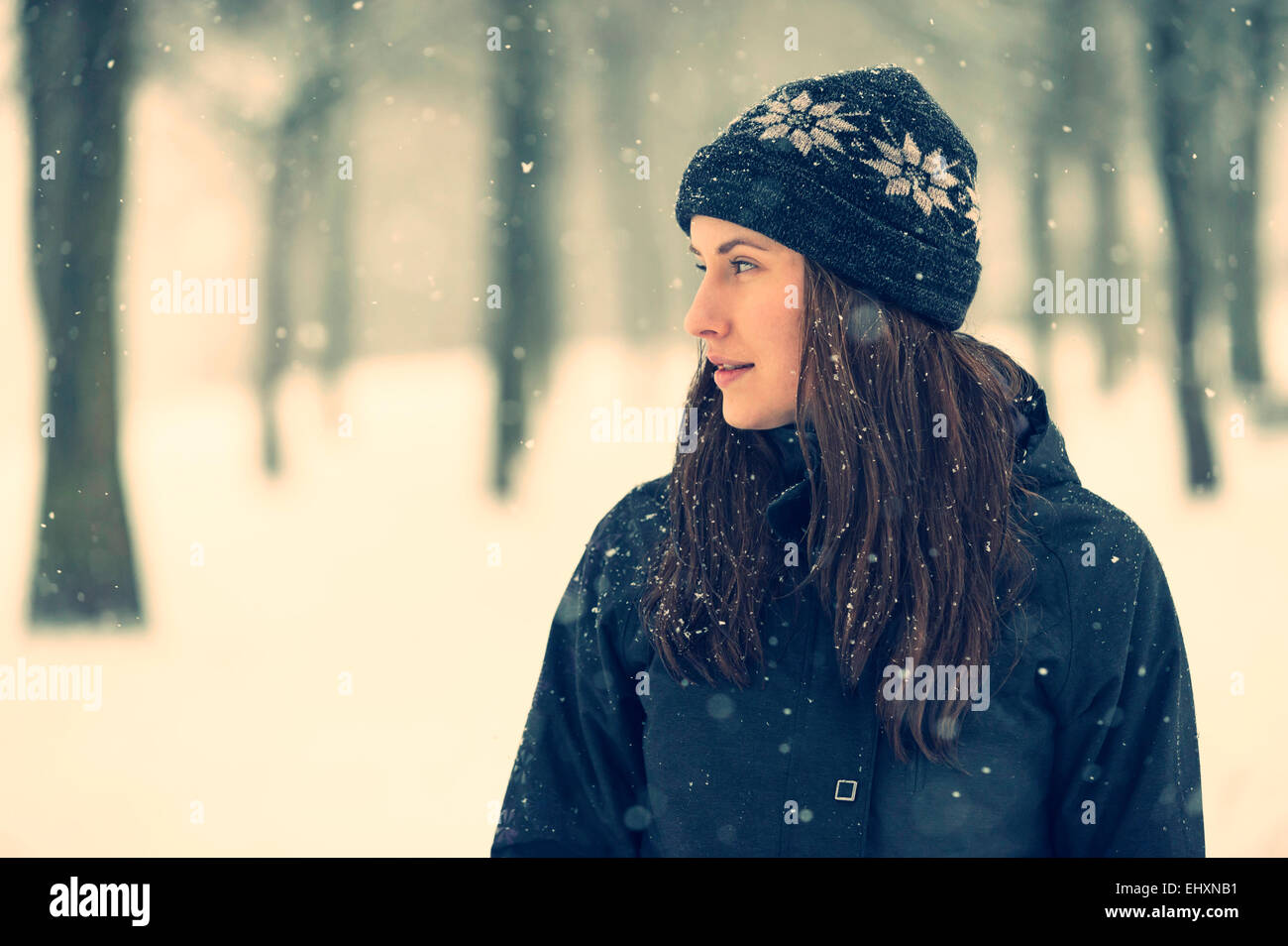 Young woman wearing wool cap in winter Stock Photo - Alamy