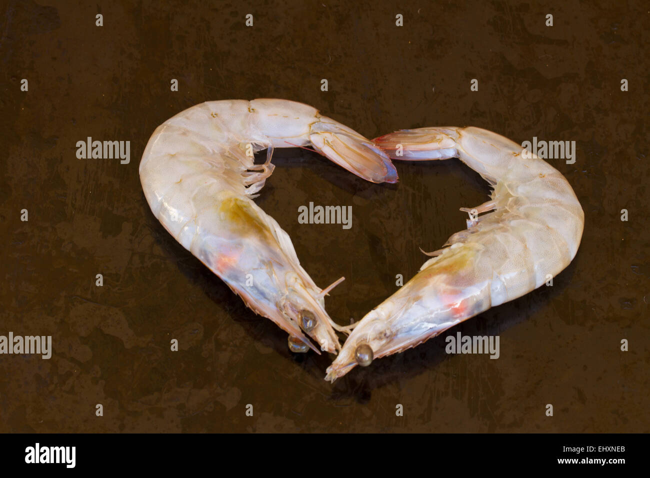 two raw prawns Stock Photo - Alamy