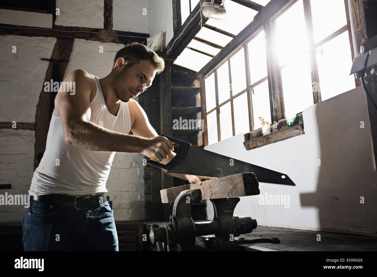 Sawing in half hi-res stock photography and images - Alamy
