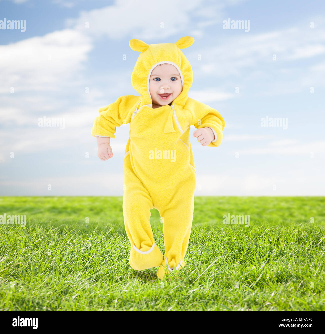 little happy baby making his first steps Stock Photo - Alamy