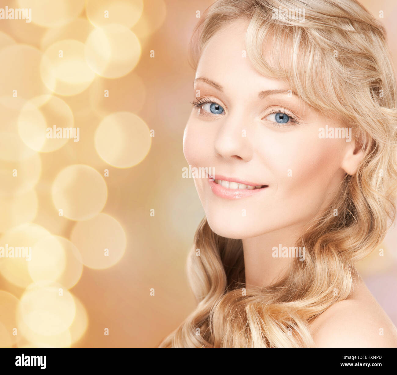 beautiful young woman face with long wavy hair Stock Photo - Alamy
