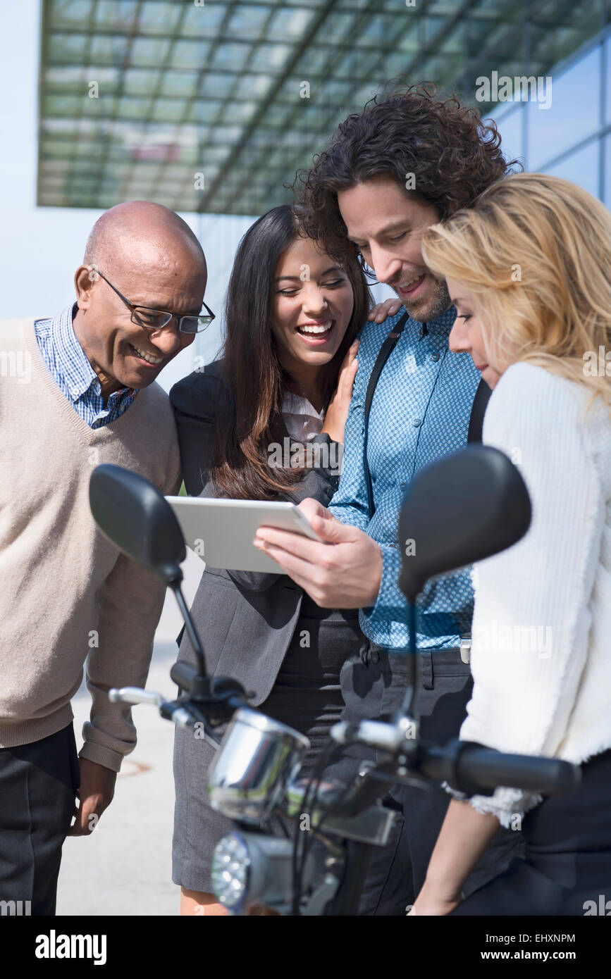 Meeting multicultural group people tablet computer Stock Photo - Alamy