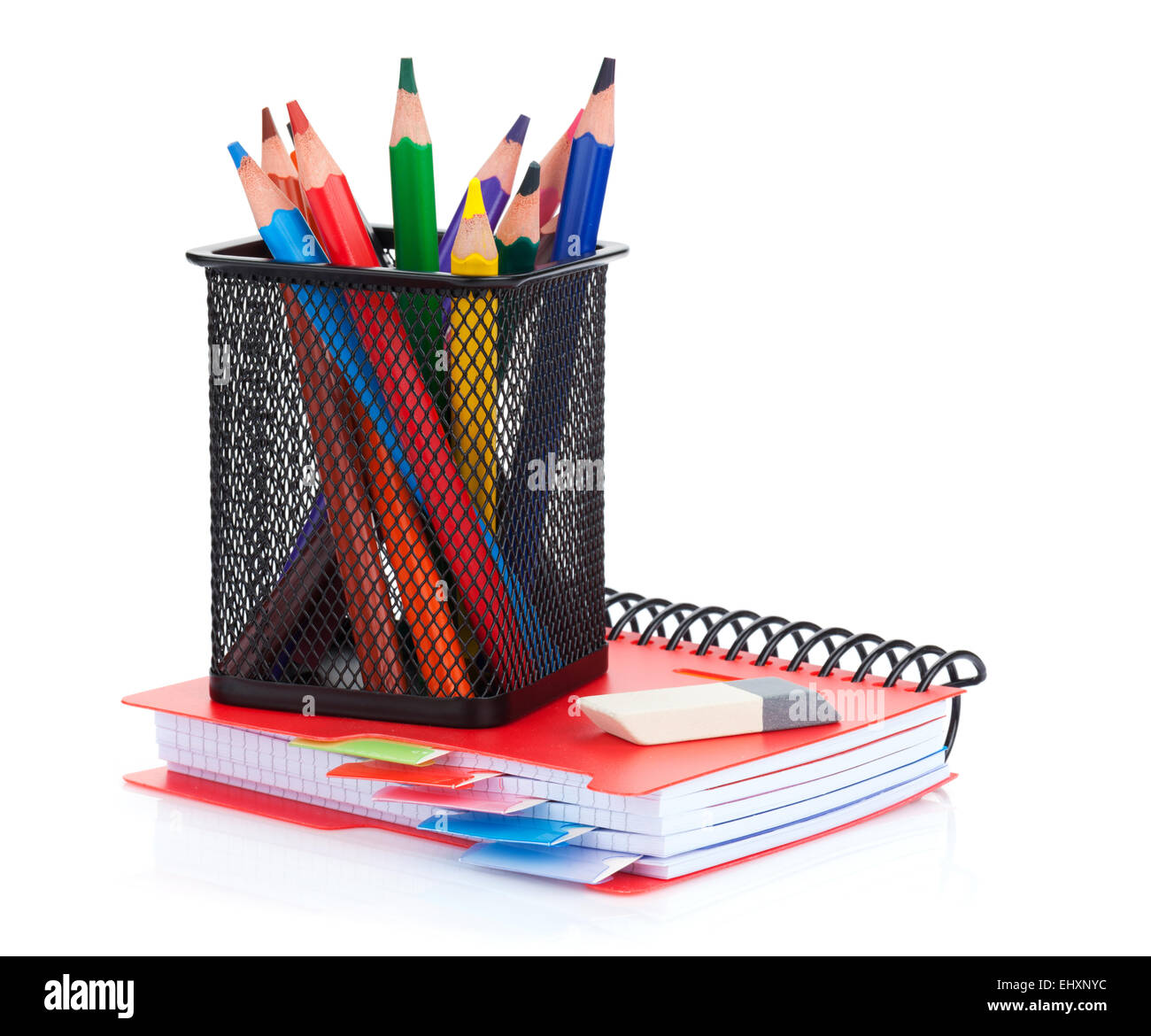 Colorful pencils and notepad. Isolated on white background Stock Photo ...